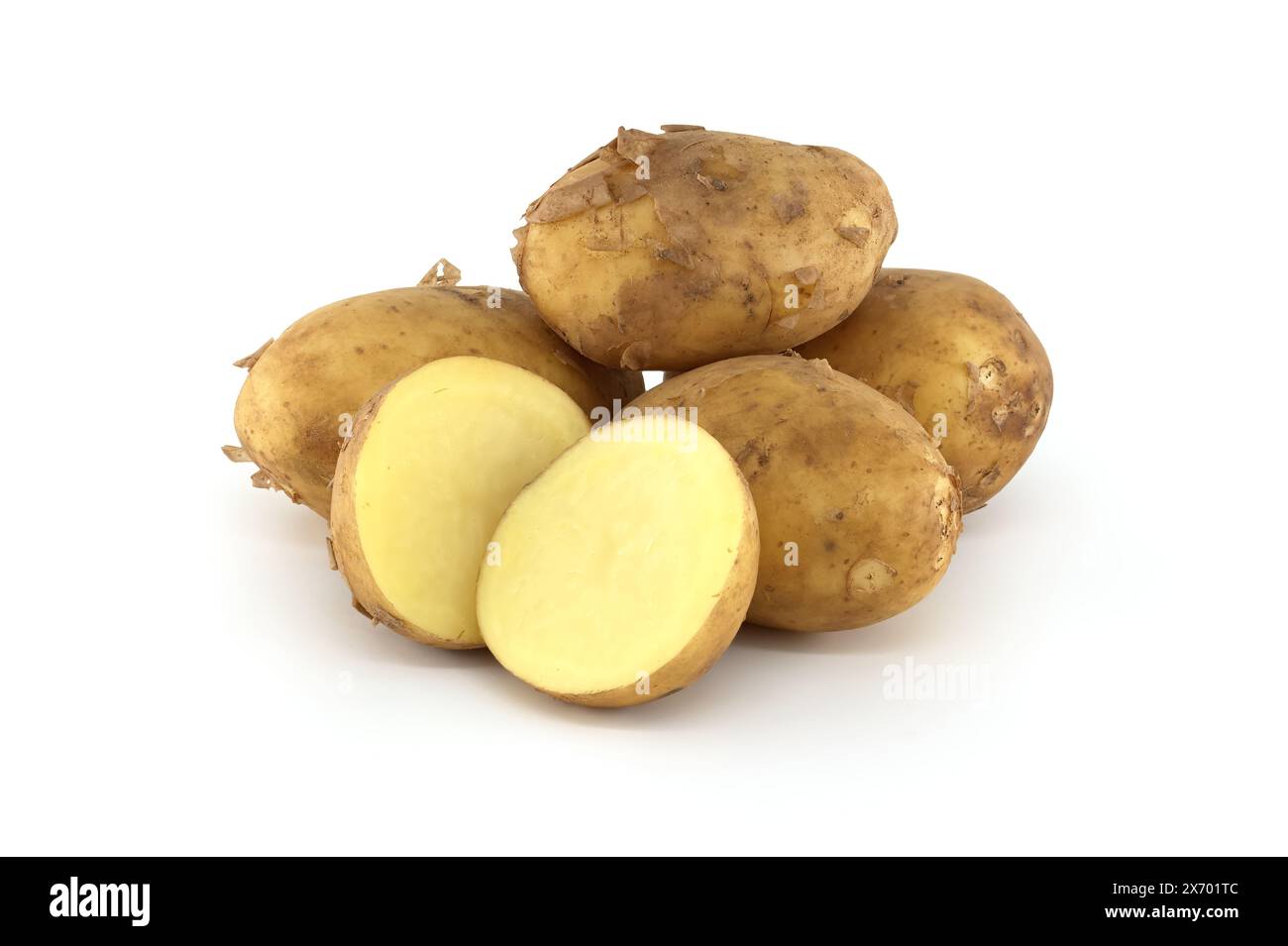 Early season potatoes with a light brown skin isolated on a white ...