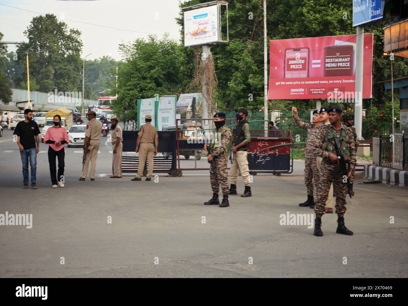 Indian paramilitary troopers along with senior police officers stand as ...