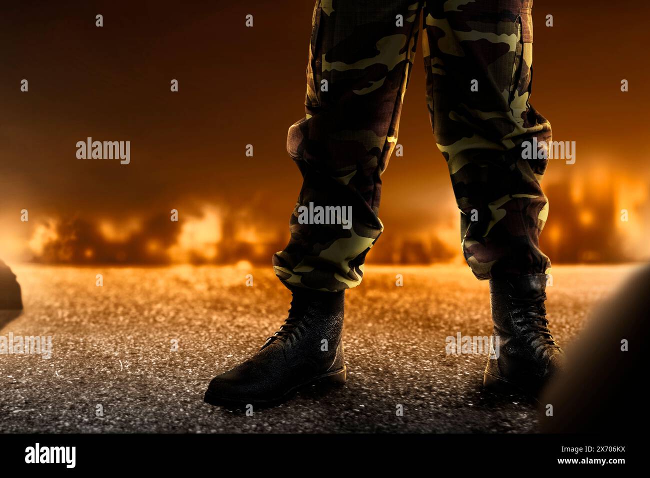 Soldier feet with military boots standing with fire and explosion on ...