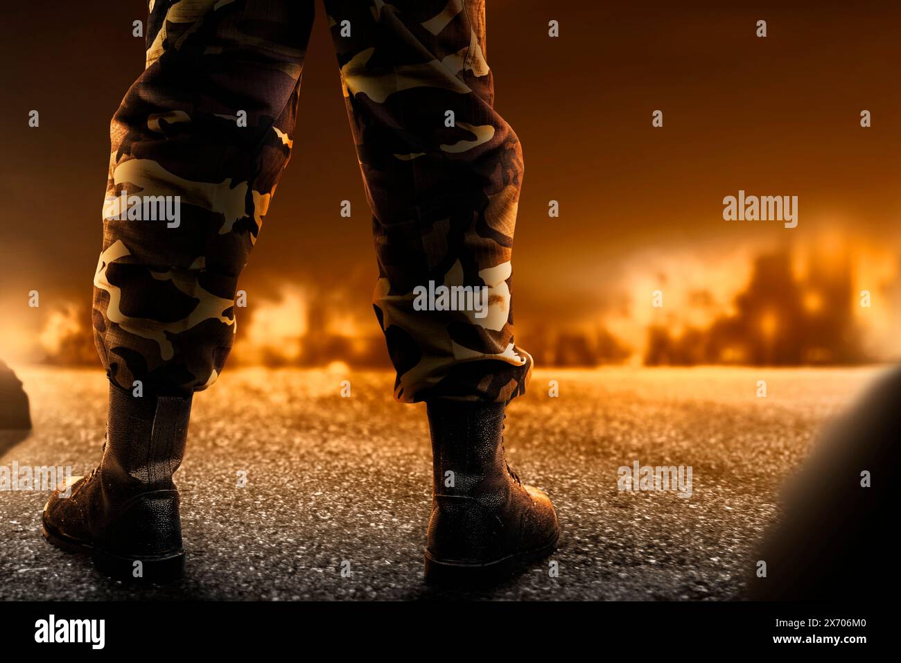 Soldier feet with military boots standing with fire and explosion on ...