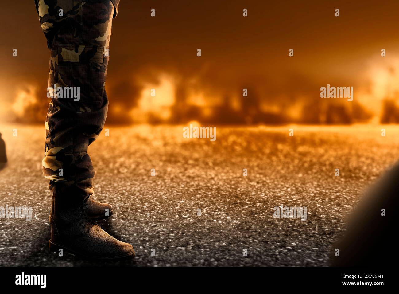 Soldier feet with military boots standing with fire and explosion on ...