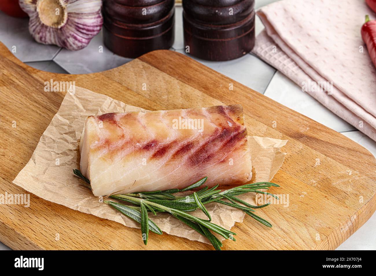 Raw cod fish steak piece for cooking Stock Photo - Alamy