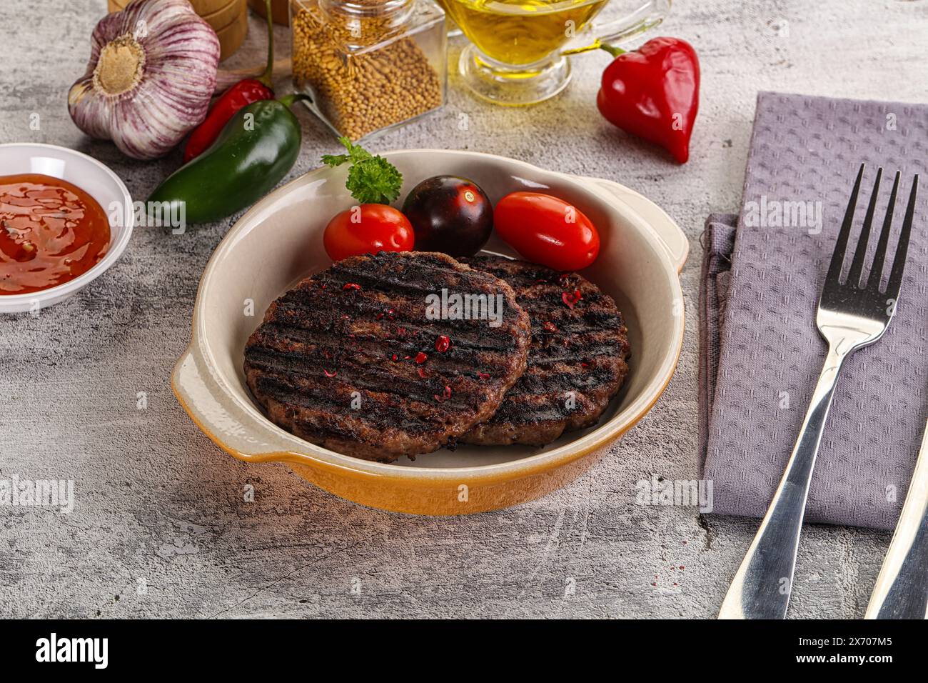 Grilled beef burger cutlet with sauce Stock Photo - Alamy