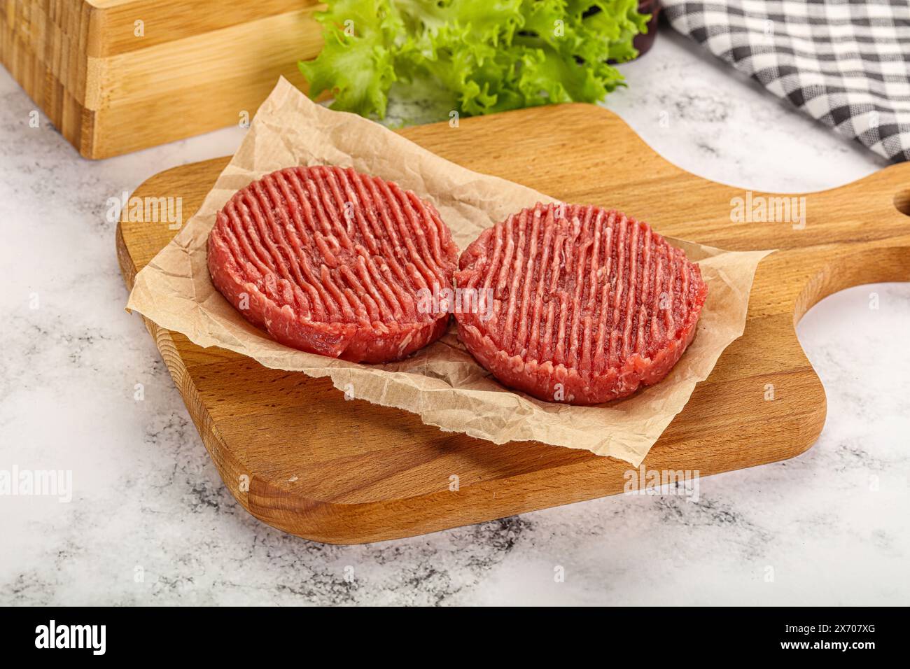 Raw beef burger cutlet minced meat for grill Stock Photo - Alamy