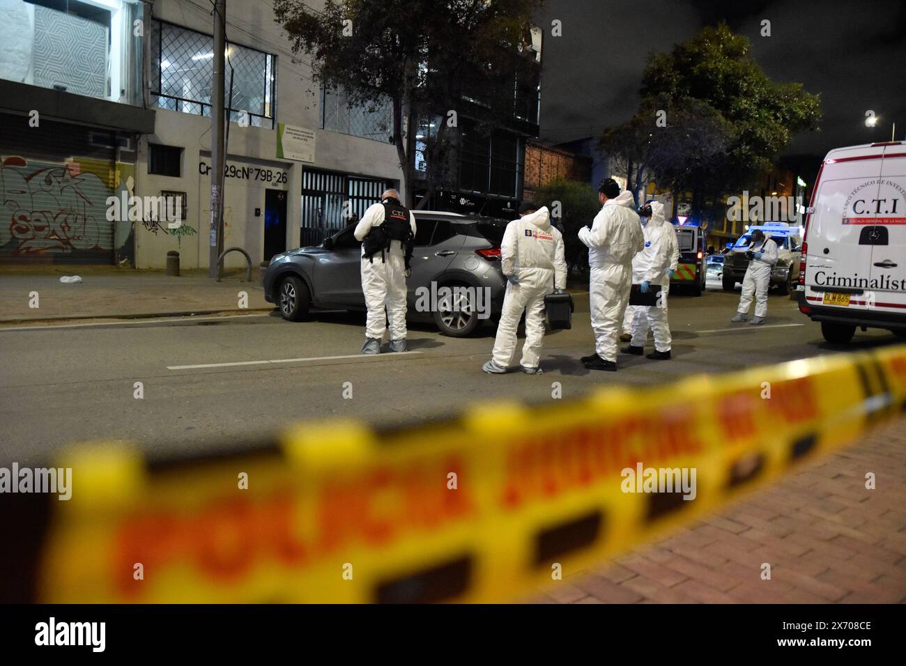 Bogota, Colombia. 16th May, 2024. Forensic workers and police officers ...
