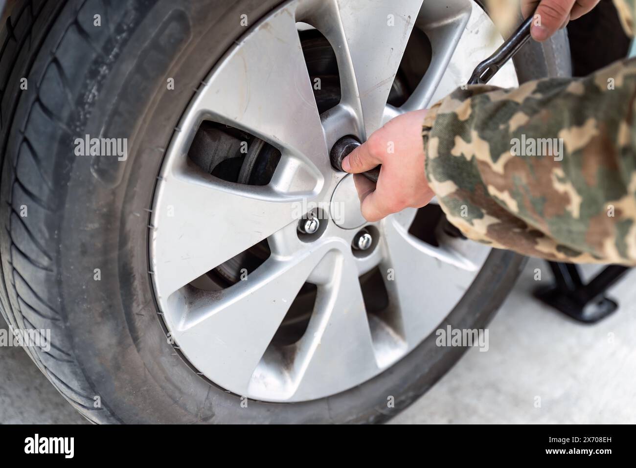 Man with tires hi-res stock photography and images - Alamy