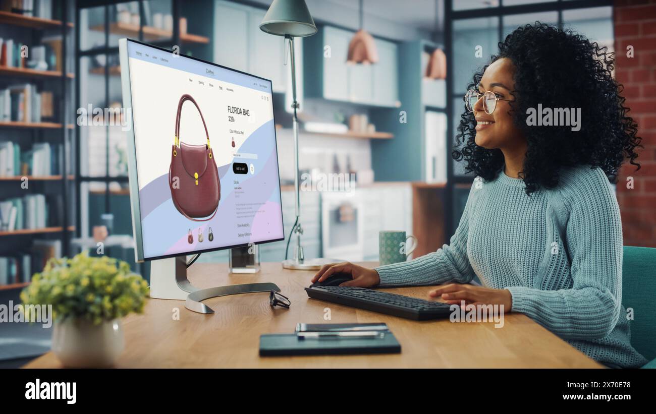 Latina Female Using Desktop Computer with Clothing Online Web Store to ...