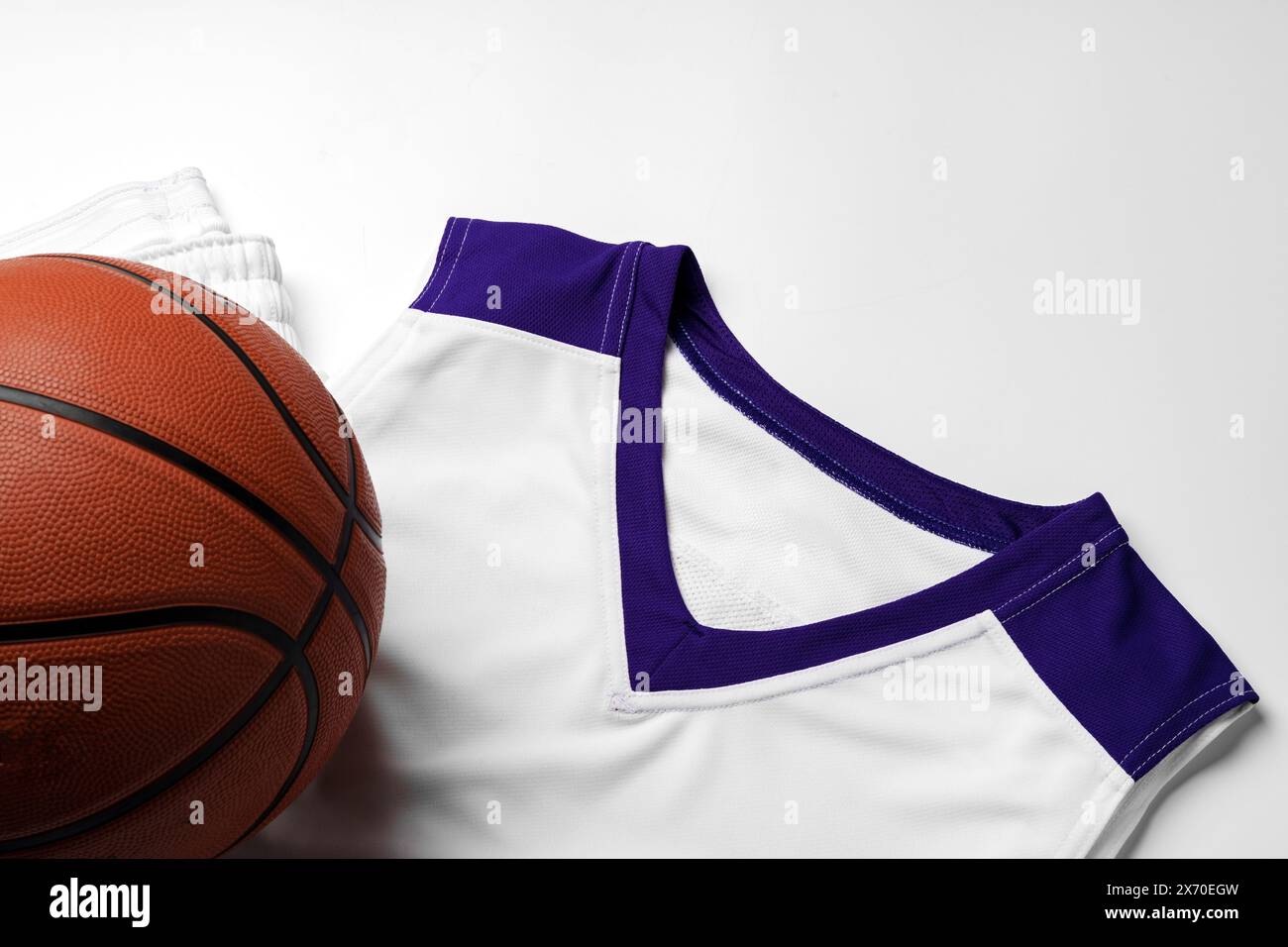 Basketball uniform on white background top view Stock Photo - Alamy