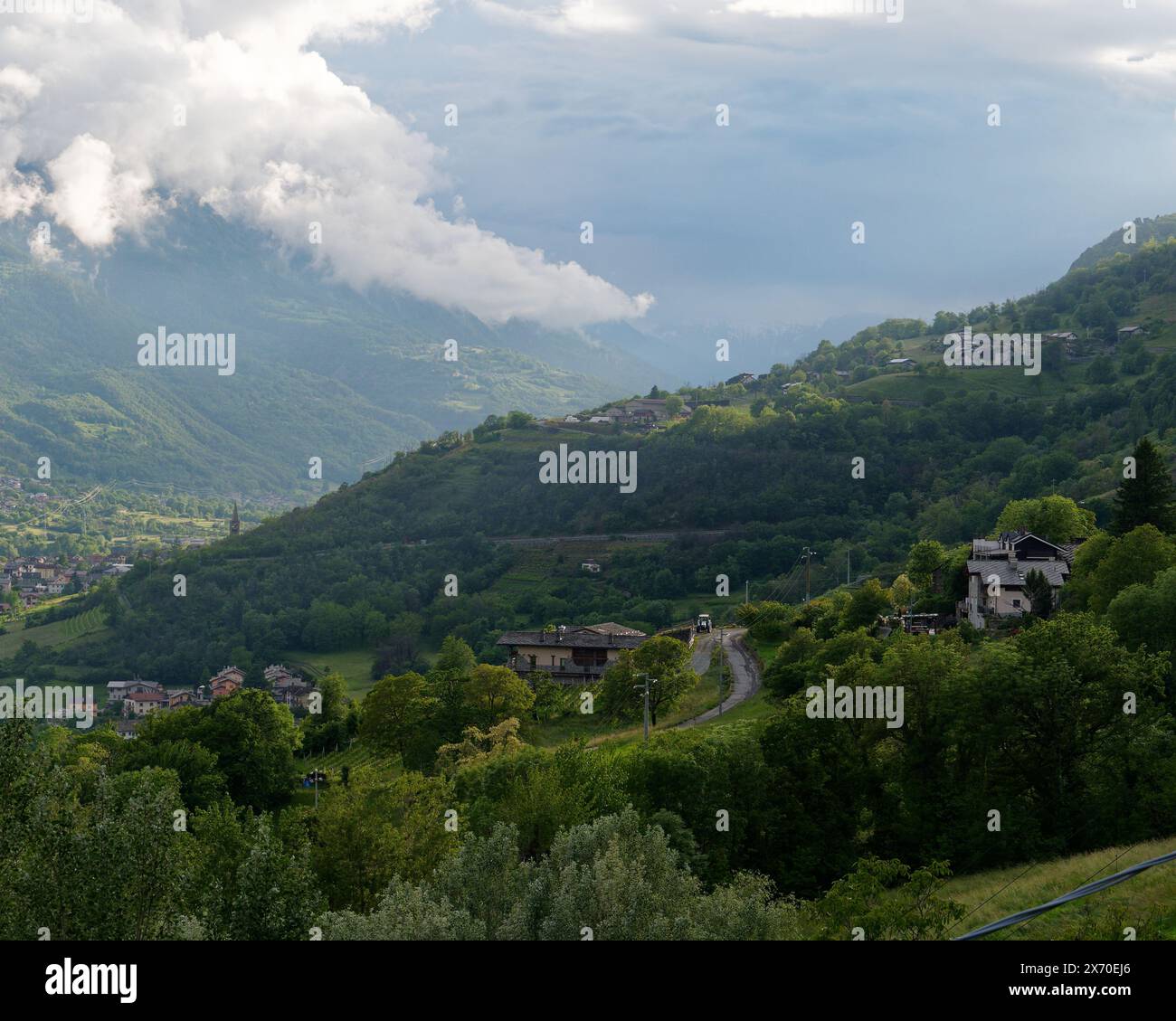 Countryside in Nus with a farmhouse, vineyard and tractor centre and ...