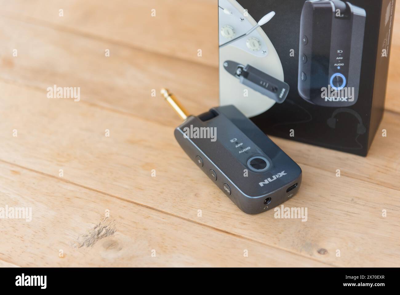 Rachaburi,Thailand - 24 April, 2024: Connect the Nu-X MP3 mighty plug ...