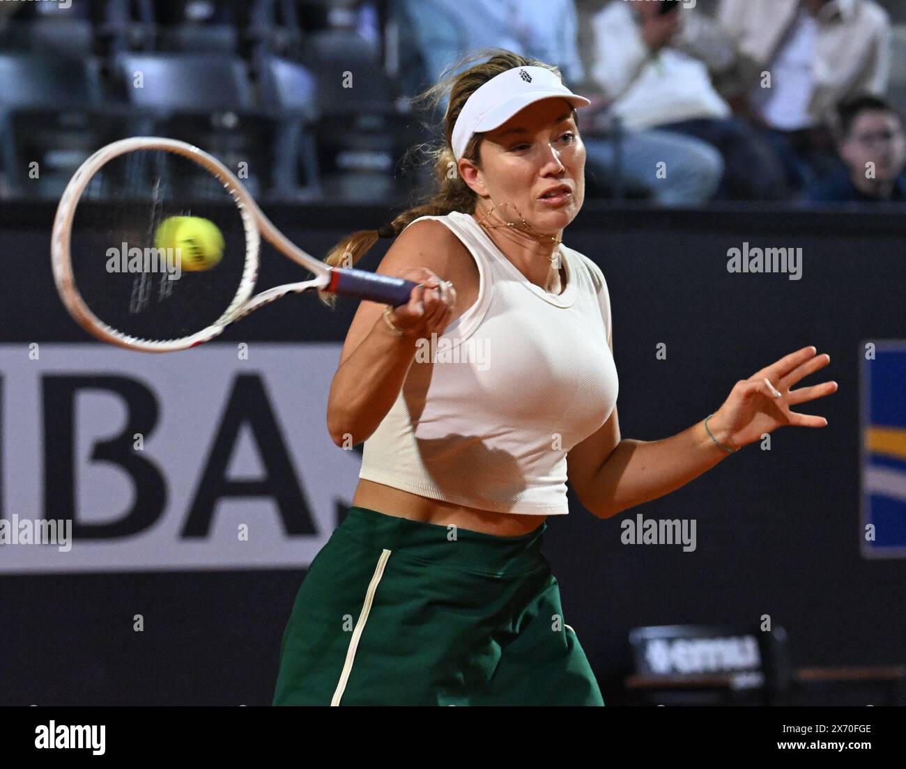 Rome, Italy. 16th May, 2024. Danielle Collins returns a shot during the ...