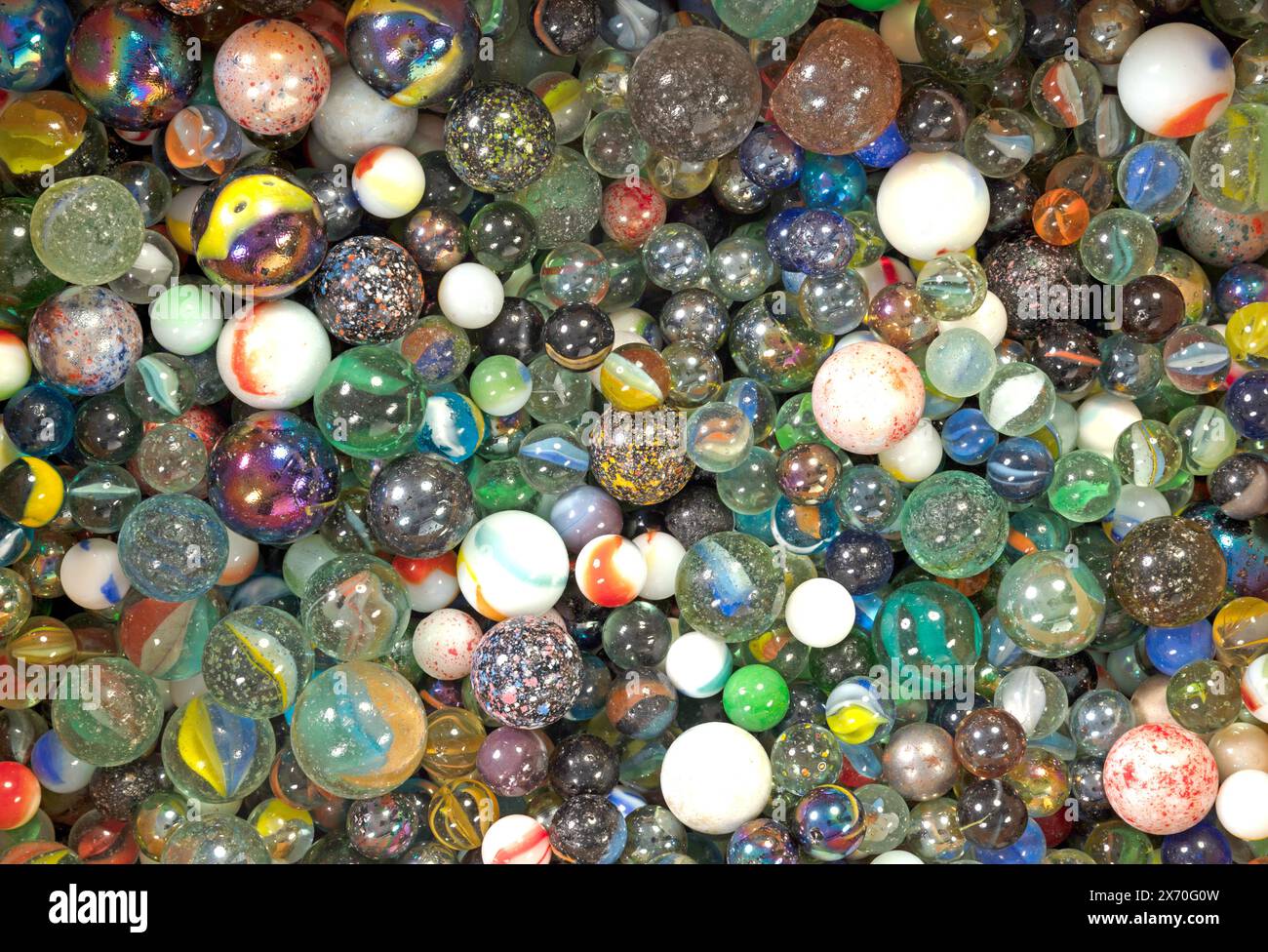 Collection of old glass marbles, isolated on white Stock Photo - Alamy