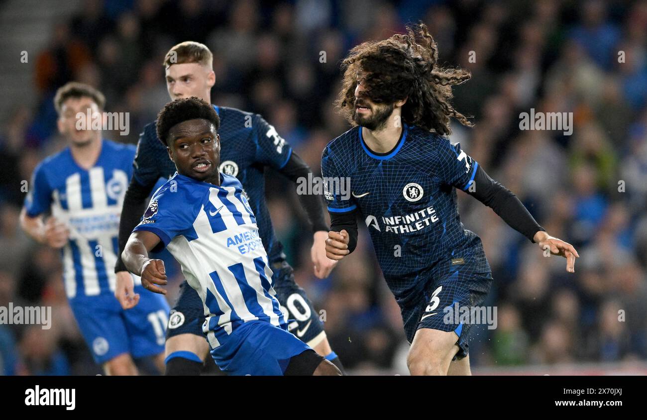 Tariq Lamptey of Brighton (left) battles with Marc Cucurella of Chelsea ...