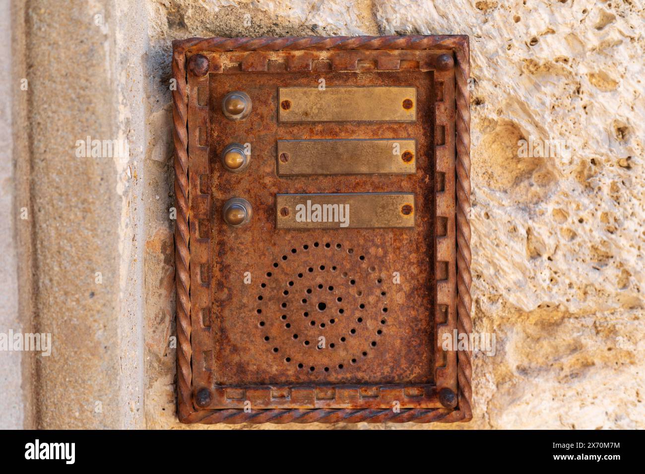 vintage intercom on weathered stone wall Stock Photo - Alamy