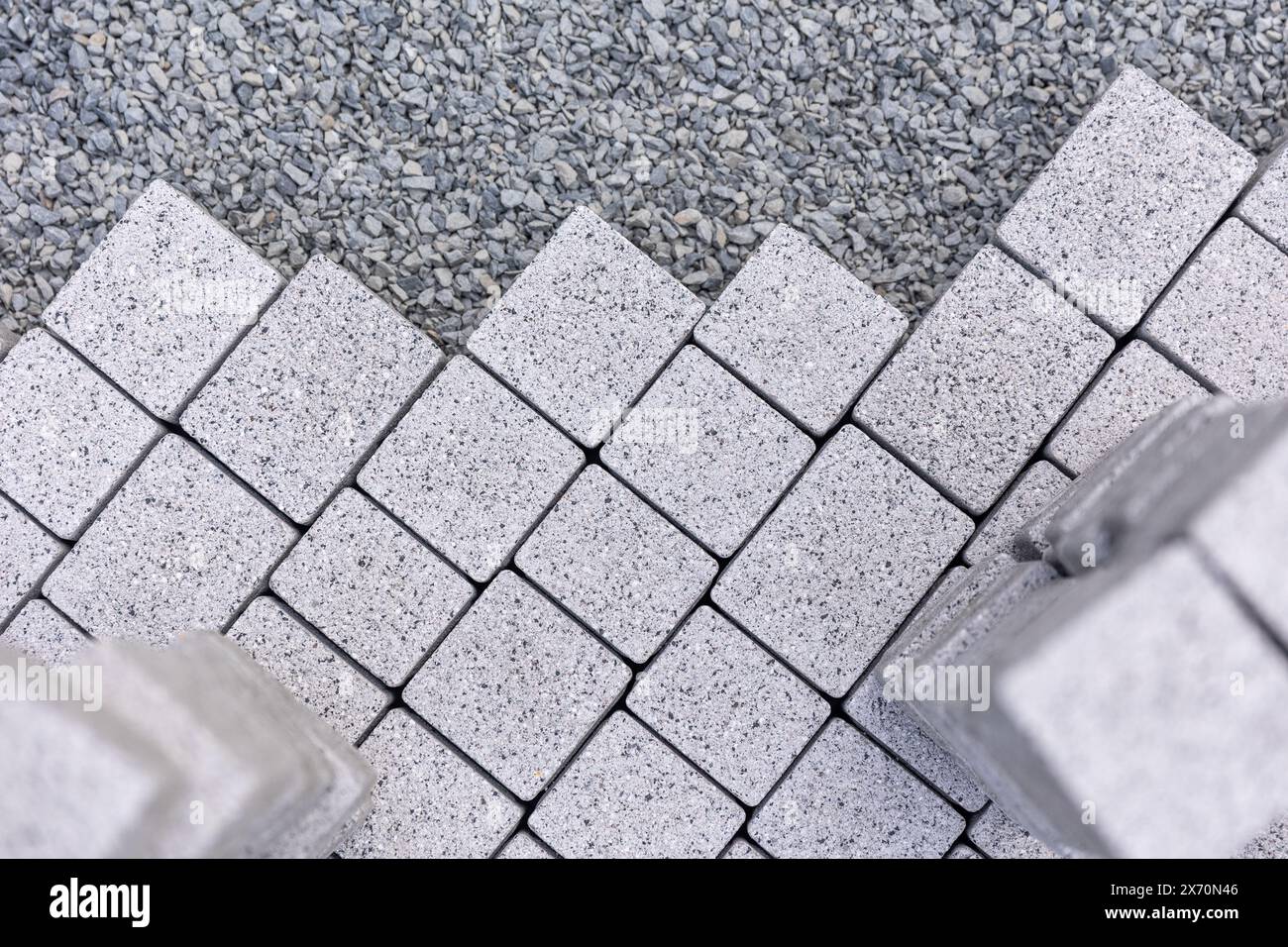 Detail to sidewalk interlocking paving, building concept Stock Photo - Alamy