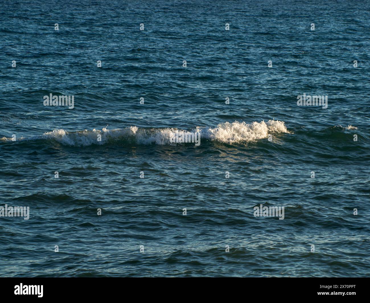 Beautiful curved water waves are used as a background image. Ocean wave ...