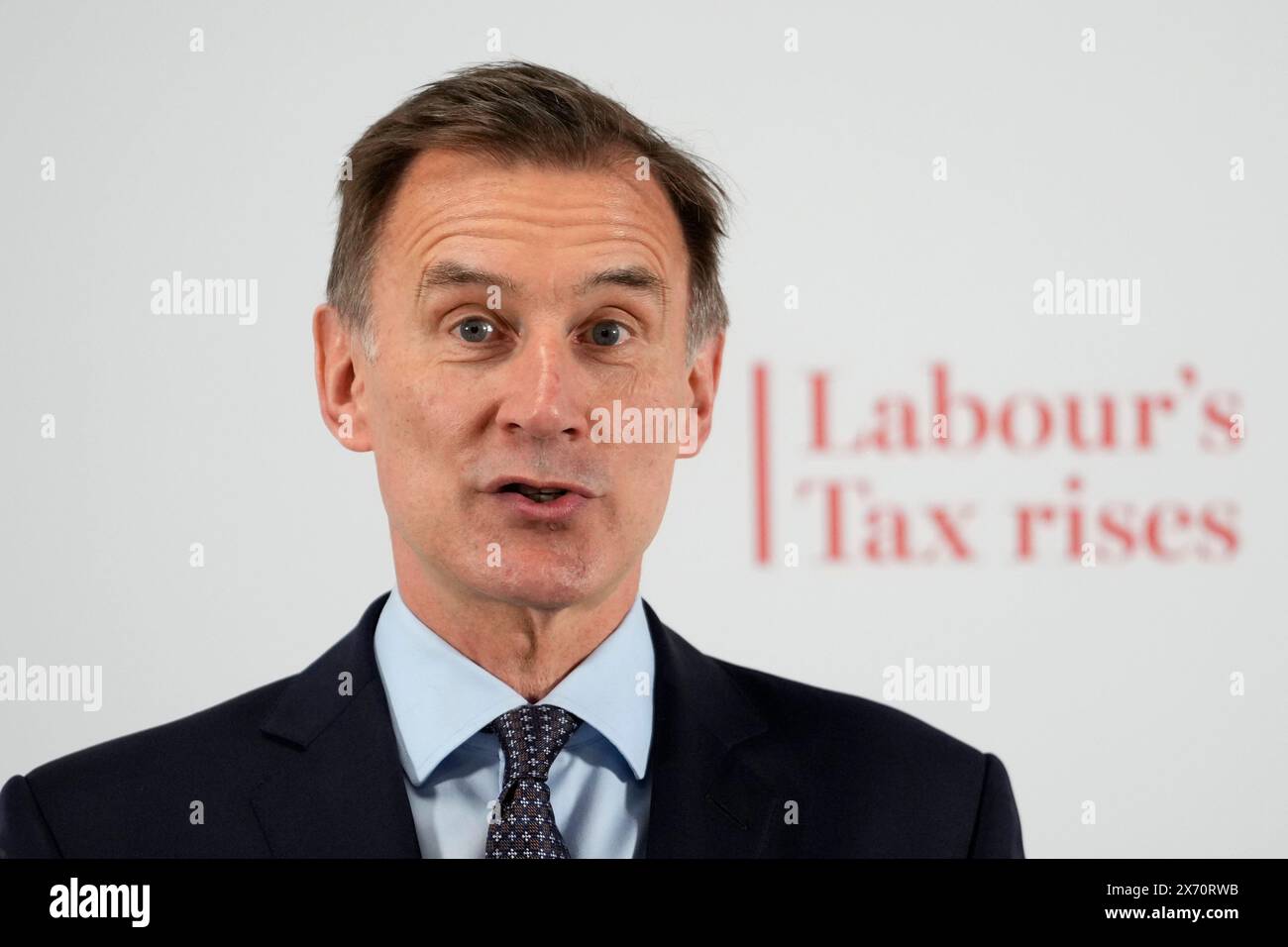 Britain's Chancellor of the Exchequer Jeremy Hunt delivers a speech in ...