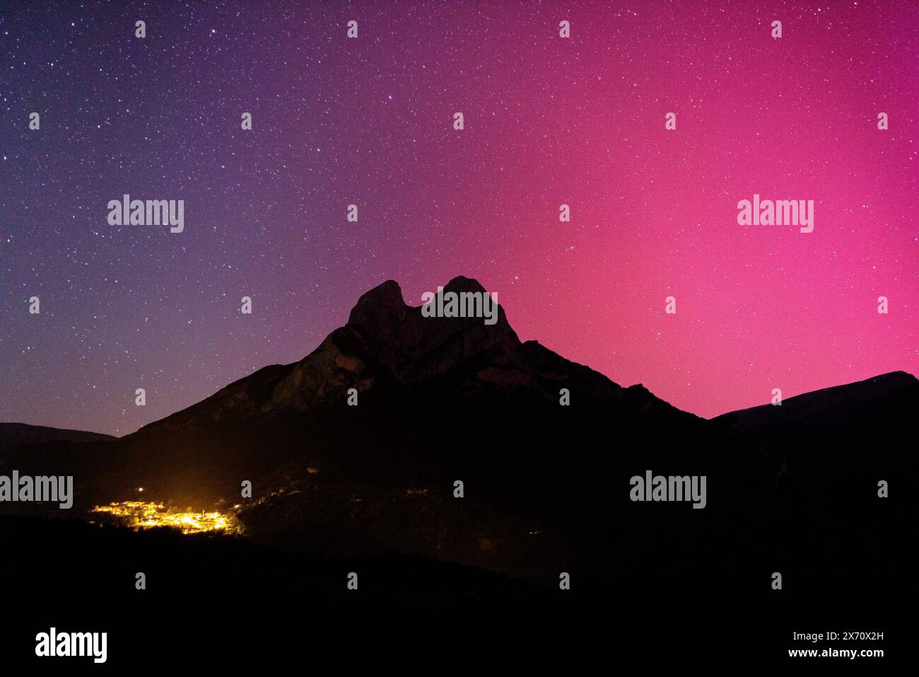 Aurora borealis over the Pedraforca mountain, in the Eastern Pyrenees ...