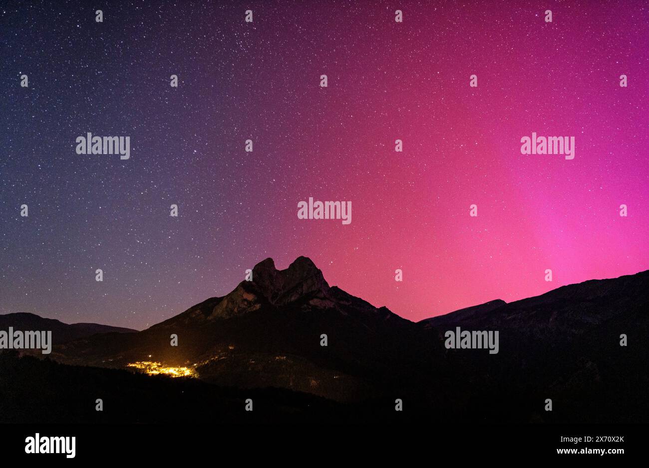 Aurora borealis over the Pedraforca mountain, in the Eastern Pyrenees ...