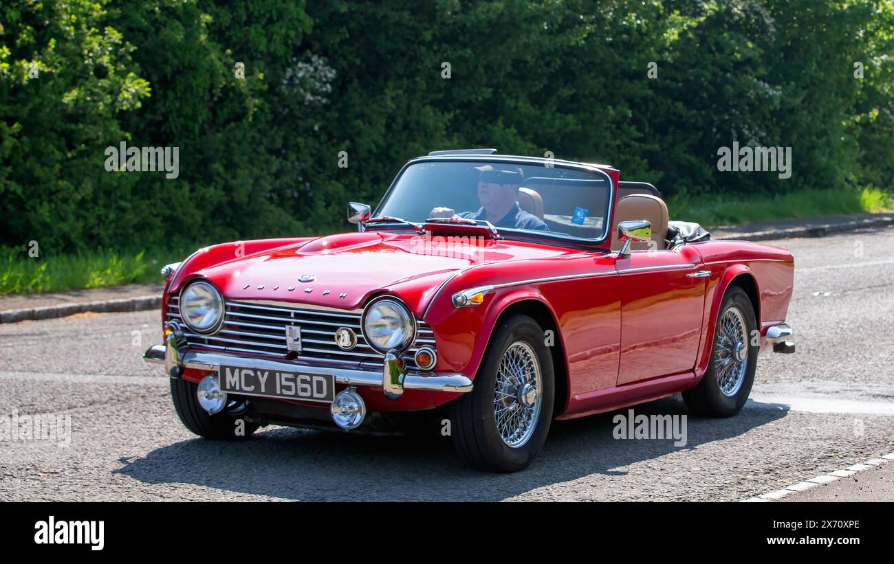 Stoke Goldington,UK - May 11th 2024: 1966 red Triumph TR4 classic car ...