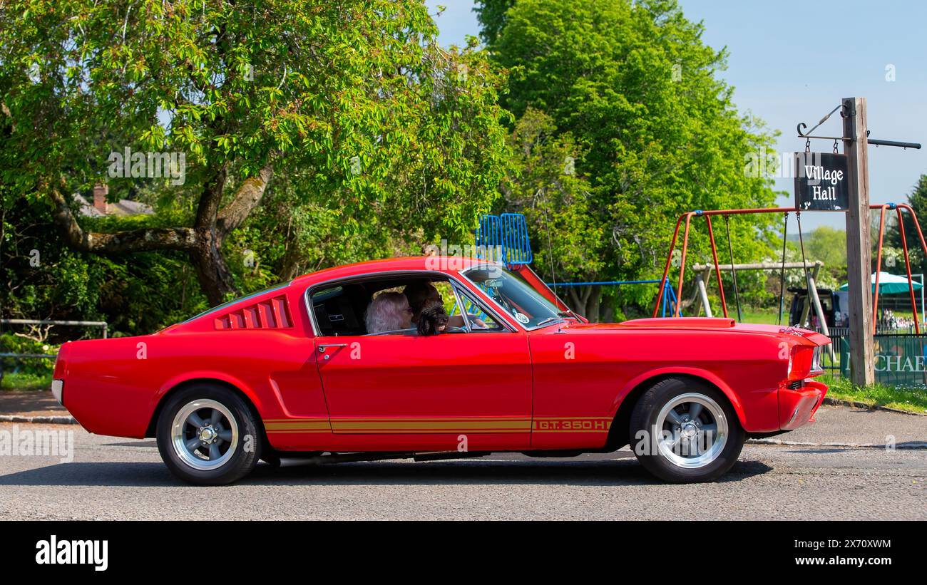 Stoke Goldington,UK - May 11th 2024: 1965 red Ford Mustang classic car ...