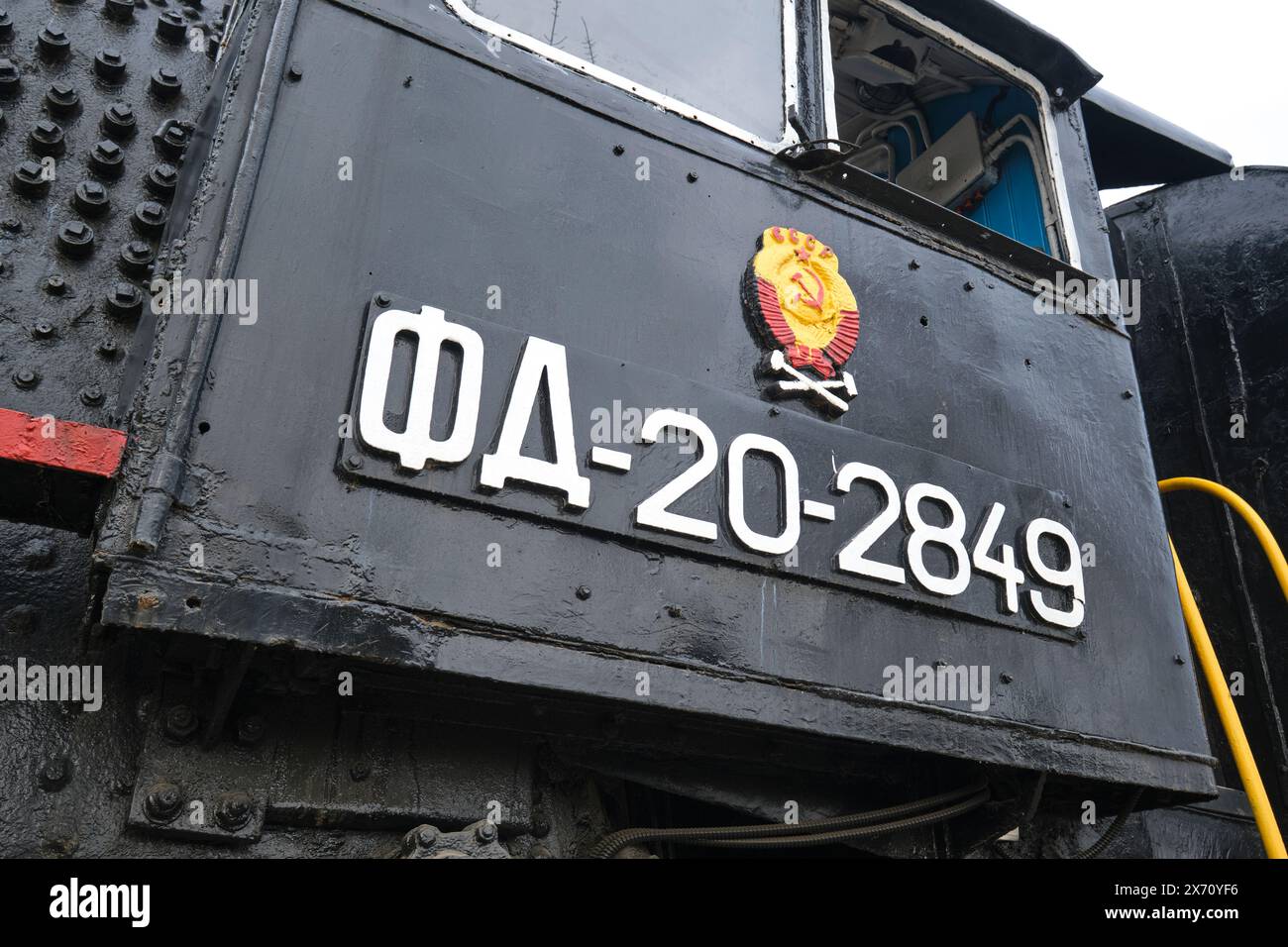Detail of an old steam locomotive Soviet symbol and identification ...