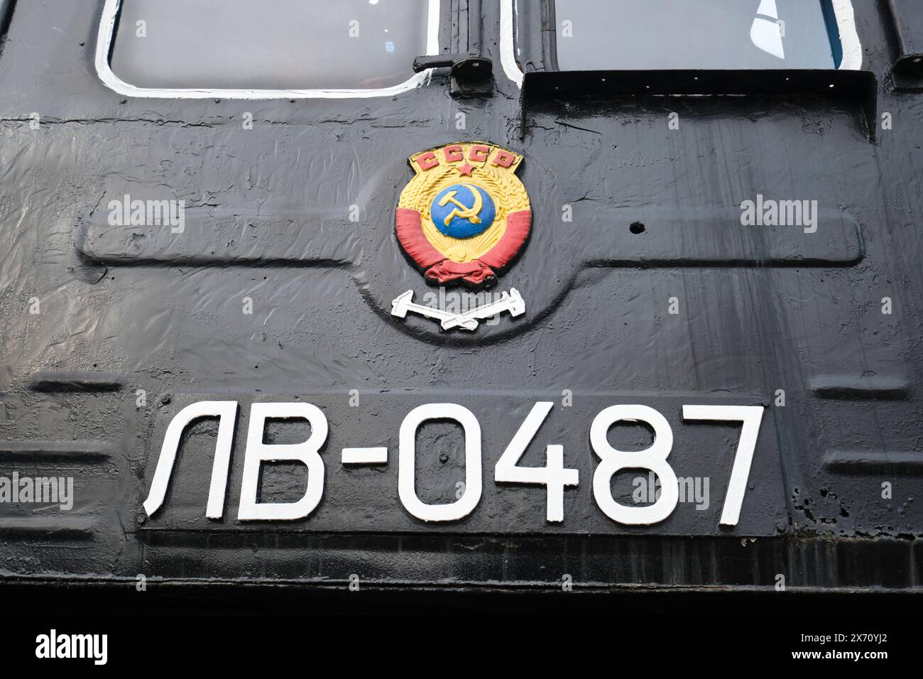 Detail of an old Soviet crest, symbol, medallion with hammer and wrench ...