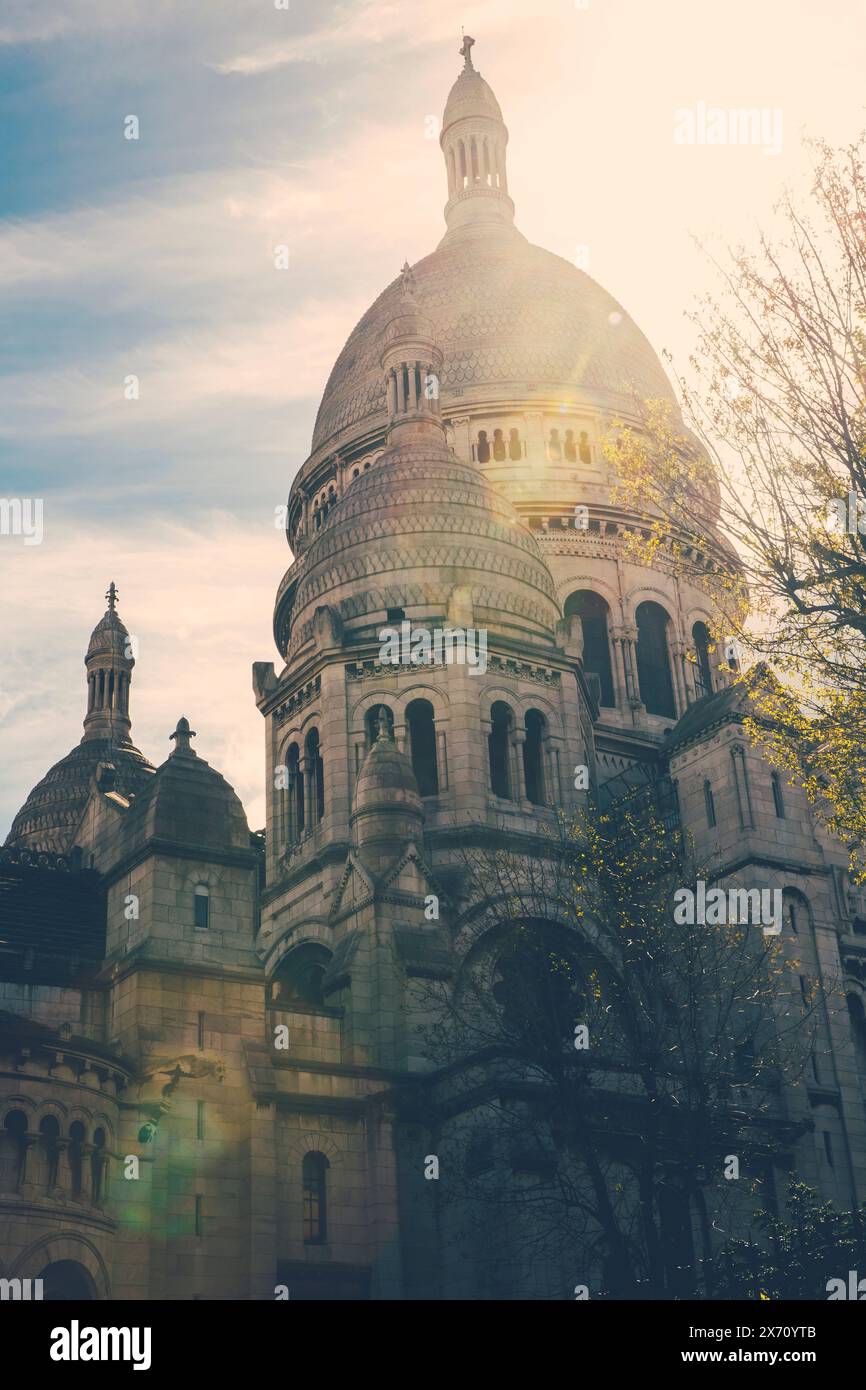 Sacre Coeur in Paris, France, with a strong lens flare Stock Photo - Alamy