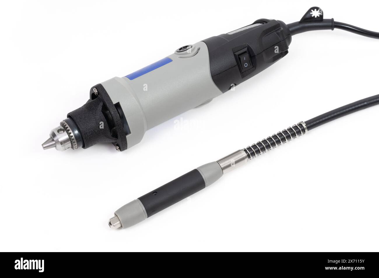 Close-up view of a compact drill and flexible shaft attachment isolated ...