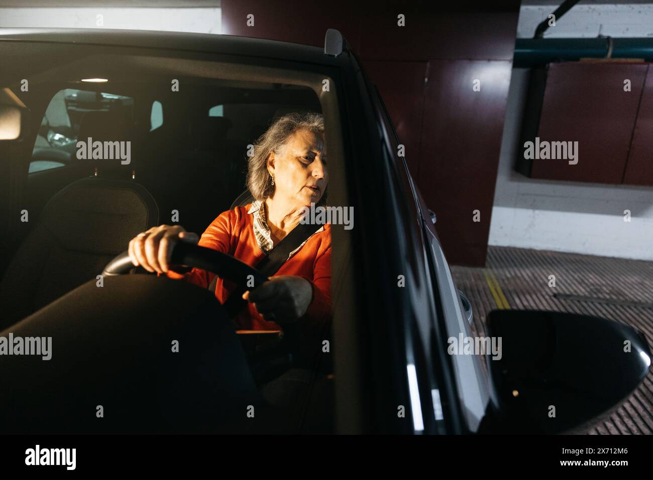 Car driving through parking garage hi-res stock photography and images ...