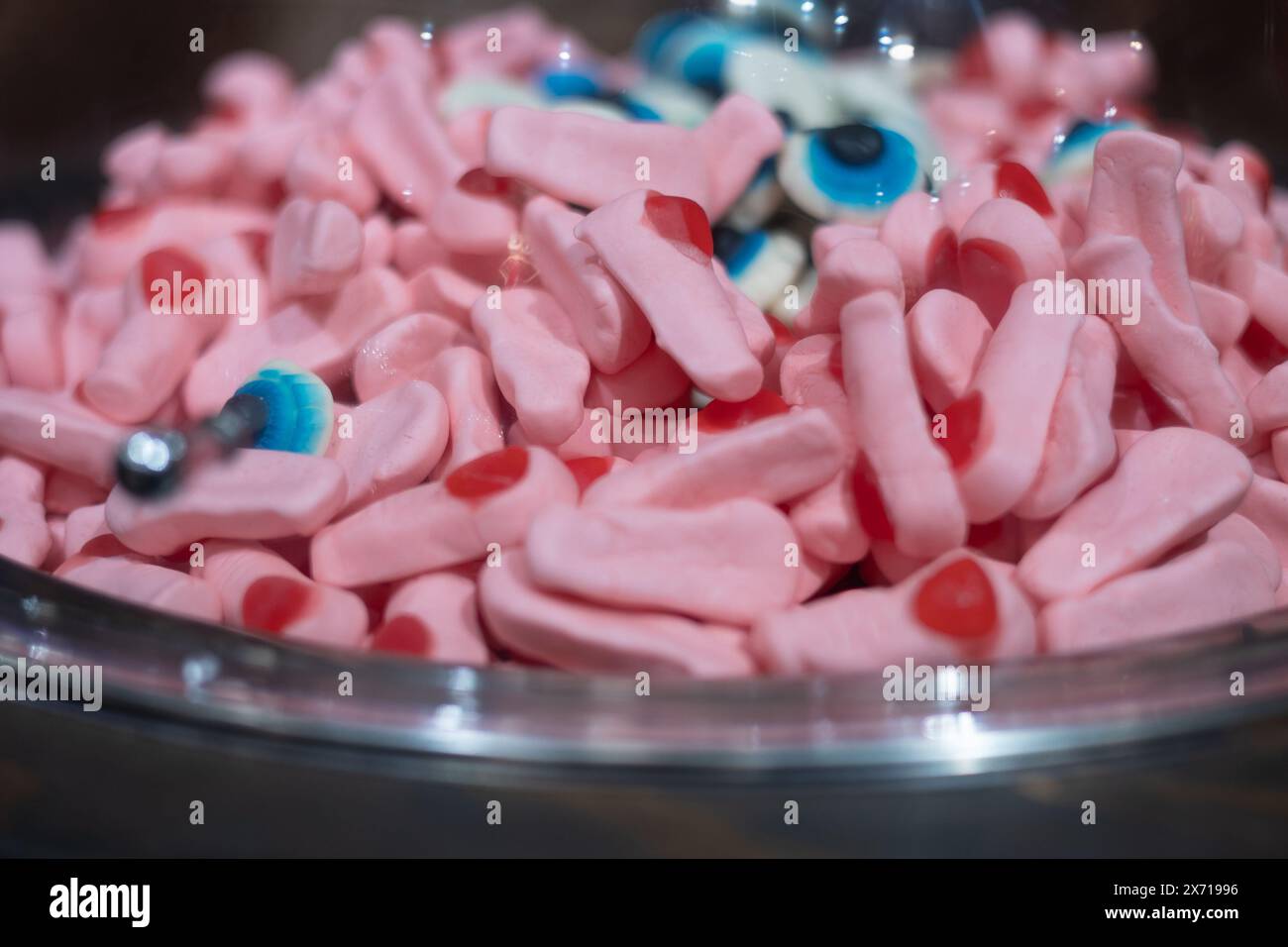 Pink and Blue Sugary Gummies and Candies in Various Shapes and Colors ...