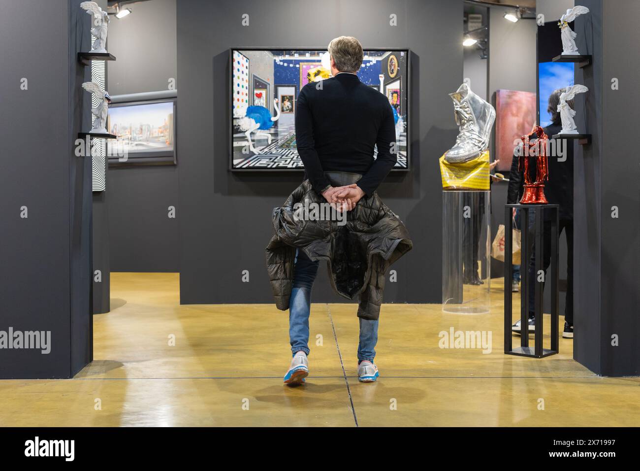 People Walking and Admiring Paintings in a Modern Art Gallery Stock ...