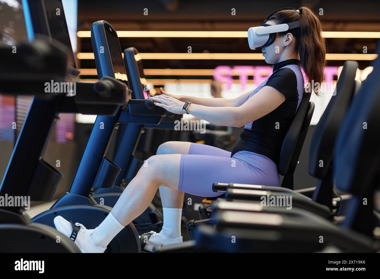 Full length side view portrait of futuristic workout on exercise ...