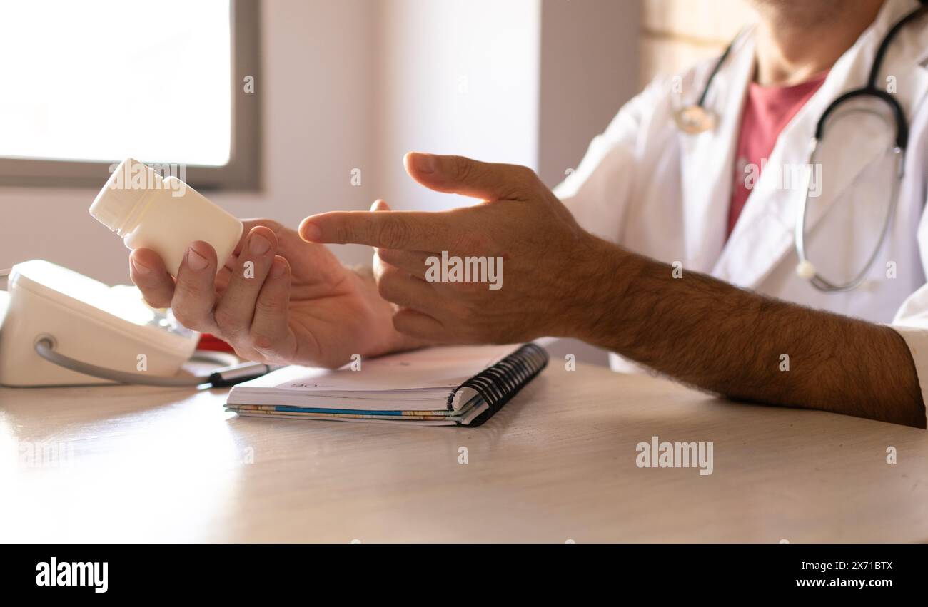 Close-up photo of a doctor giving directions to a patient about ...