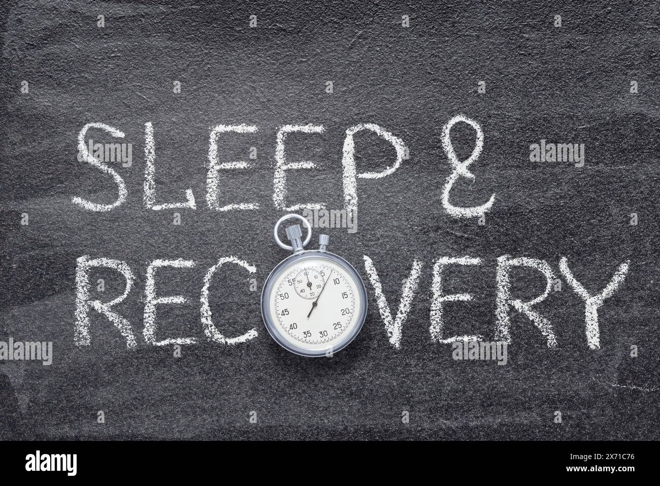 sleep and recovery phrase written on chalkboard with vintage precise ...