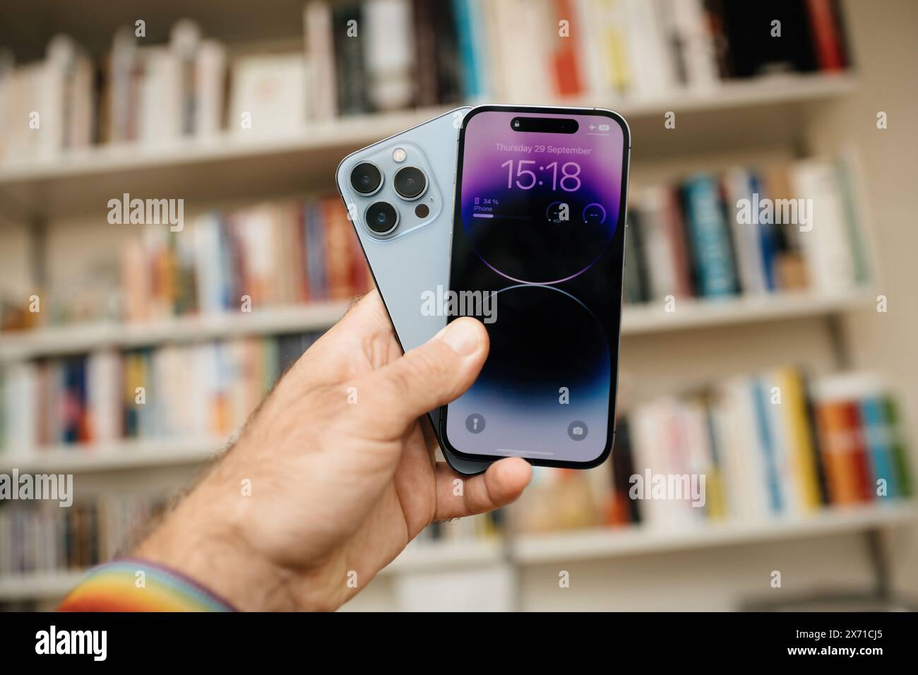 London, United Kingdom - Sep 29, 2022: A male hand presses the latest ...