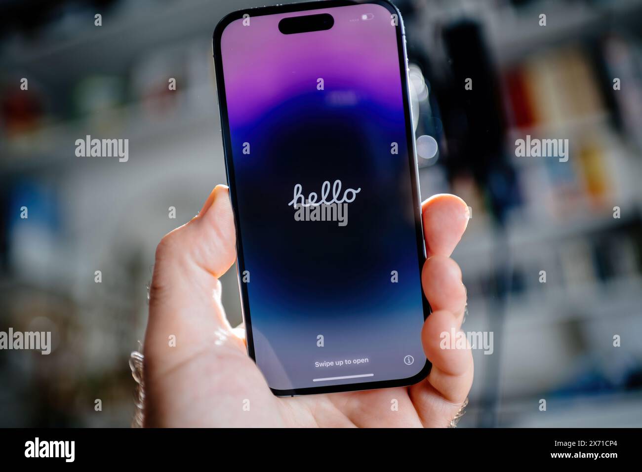 London, United Kingdom - Sep 29, 2022: A hand holds the latest iPhone ...