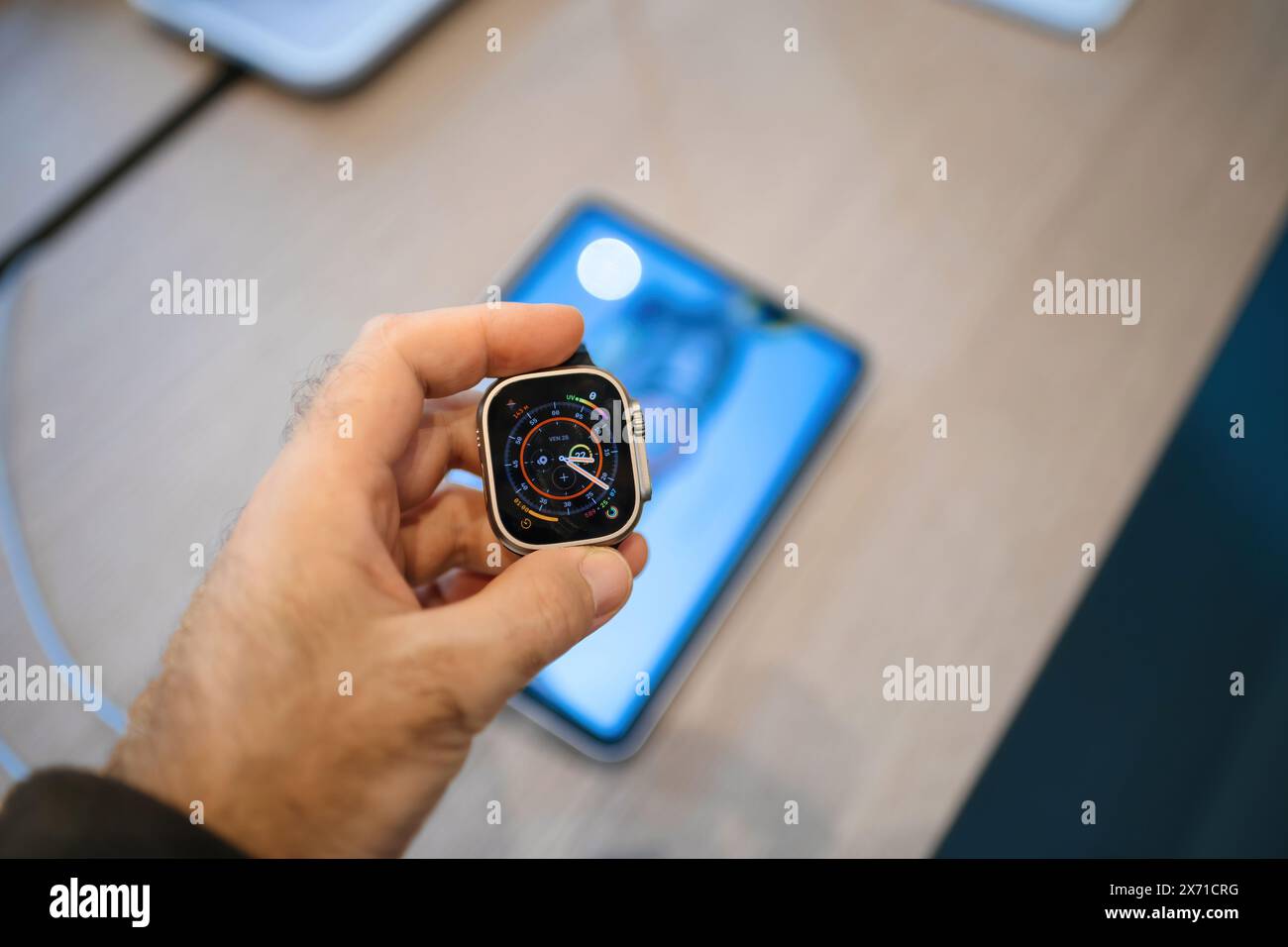 Paris, France - Oct 28, 2024:A male hand holds an Apple Watch Ultra ...
