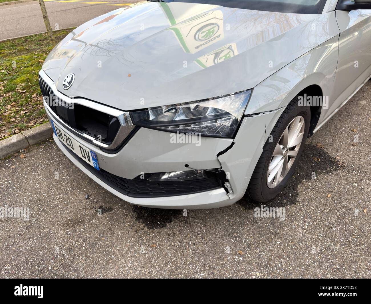 Lyon, France - Jan 29, 2024: A Skoda car with a damaged plastic ...