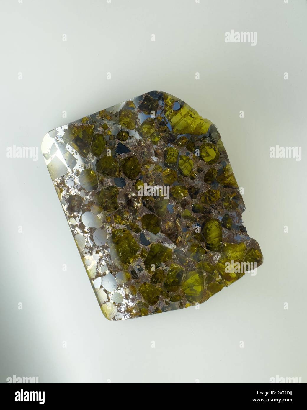 A slice of a meteorite displays a distinct Widmanstatten pattern on its ...