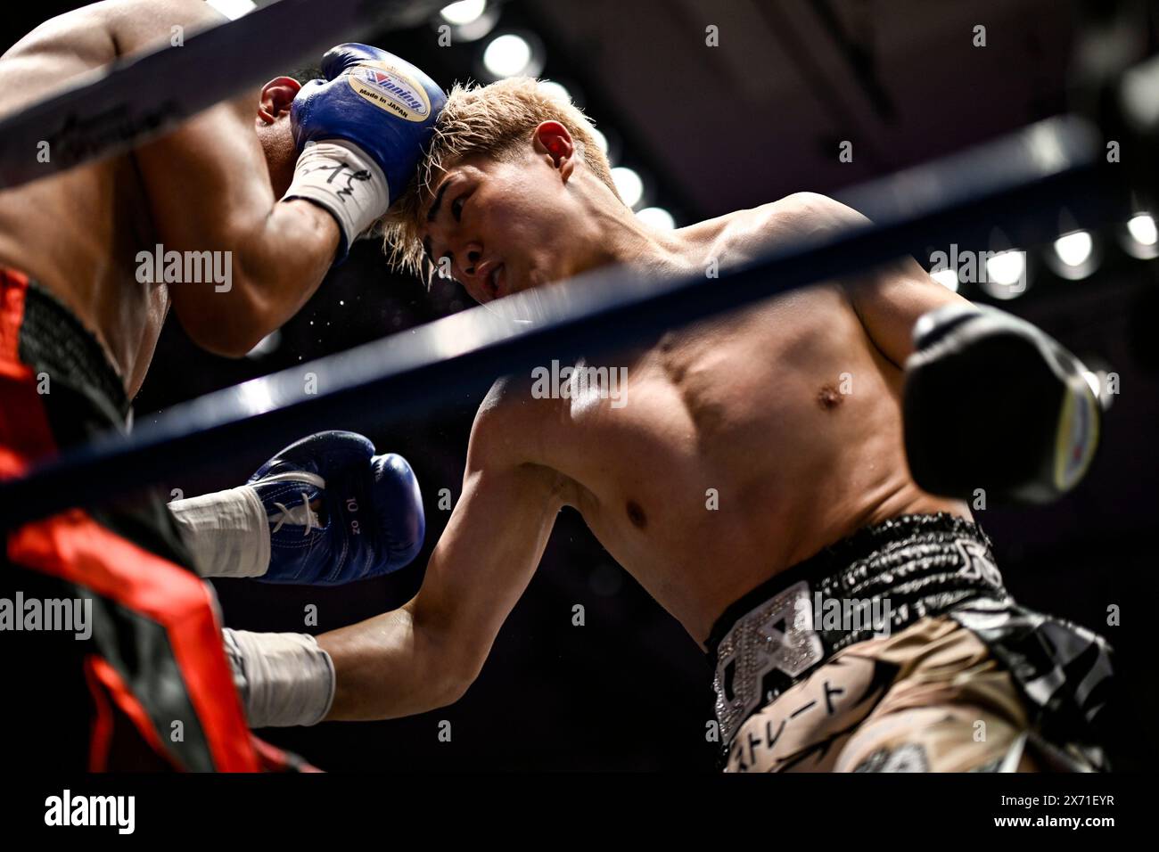 Tokyo, Japan. 16th May, 2024. Jin Sasaki (black gloves) of Japan and Joe Noynay of the ...
