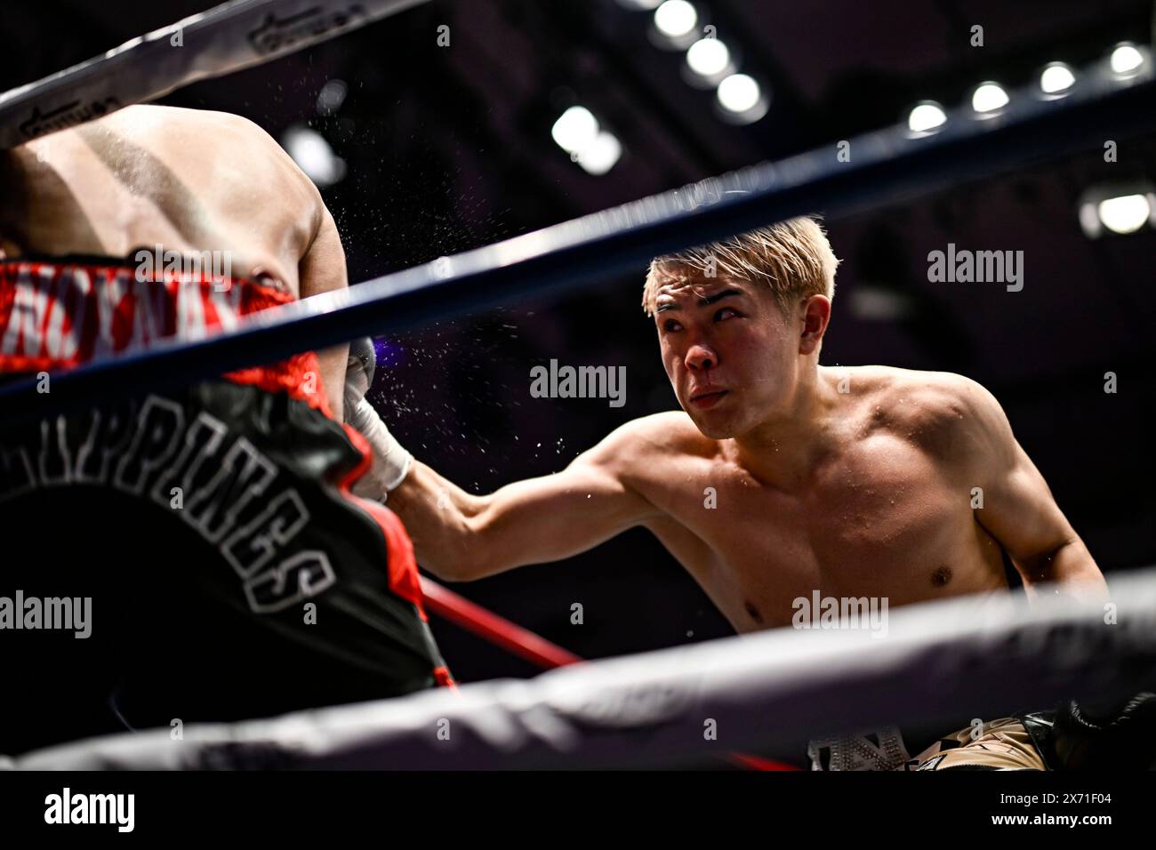 Tokyo, Japan. 16th May, 2024. Jin Sasaki (black gloves) of Japan and Joe Noynay of the ...