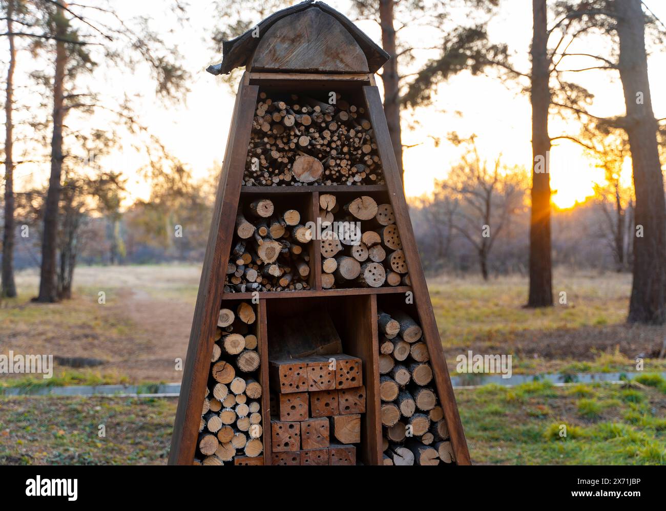 Wooden insect hotel, habitat in the Almaty Botanical Garden Stock Photo ...