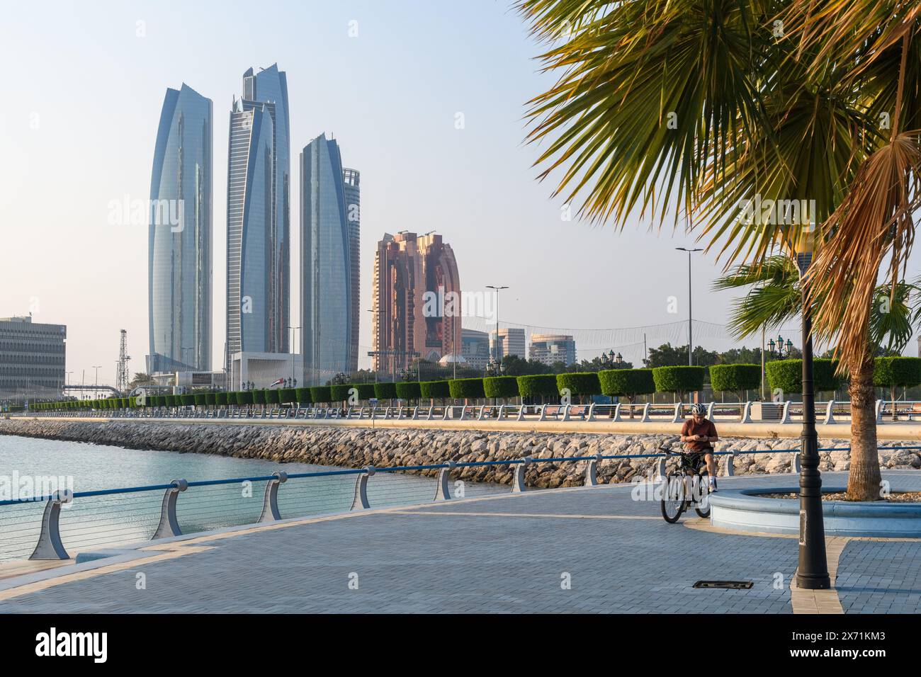 Abu Dhabi, UAE - January 4, 2024: A cyclist enjoys a sunny day on the ...