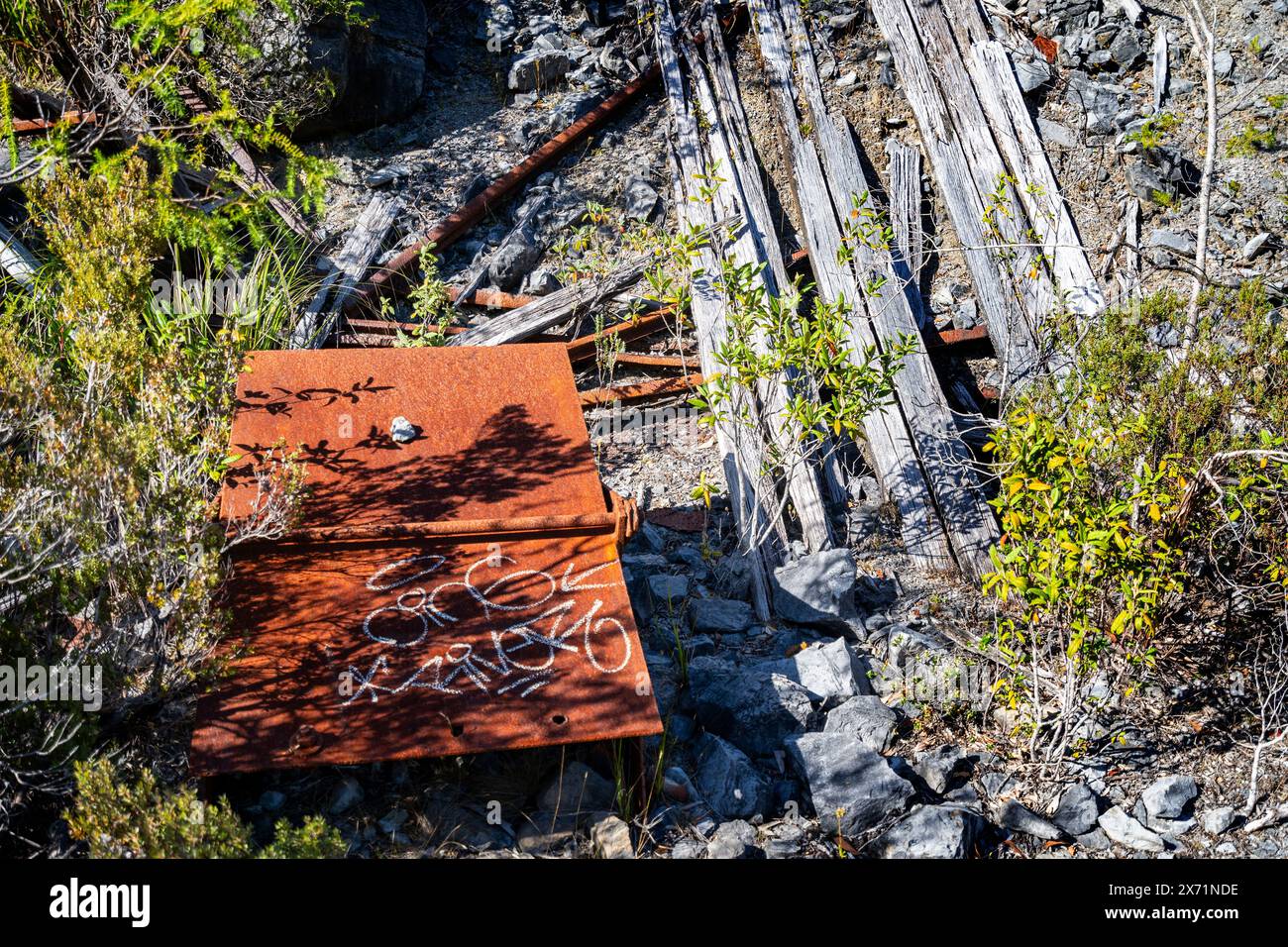 Abandoned rusted mining equipment on Mystery Creek walking track ...