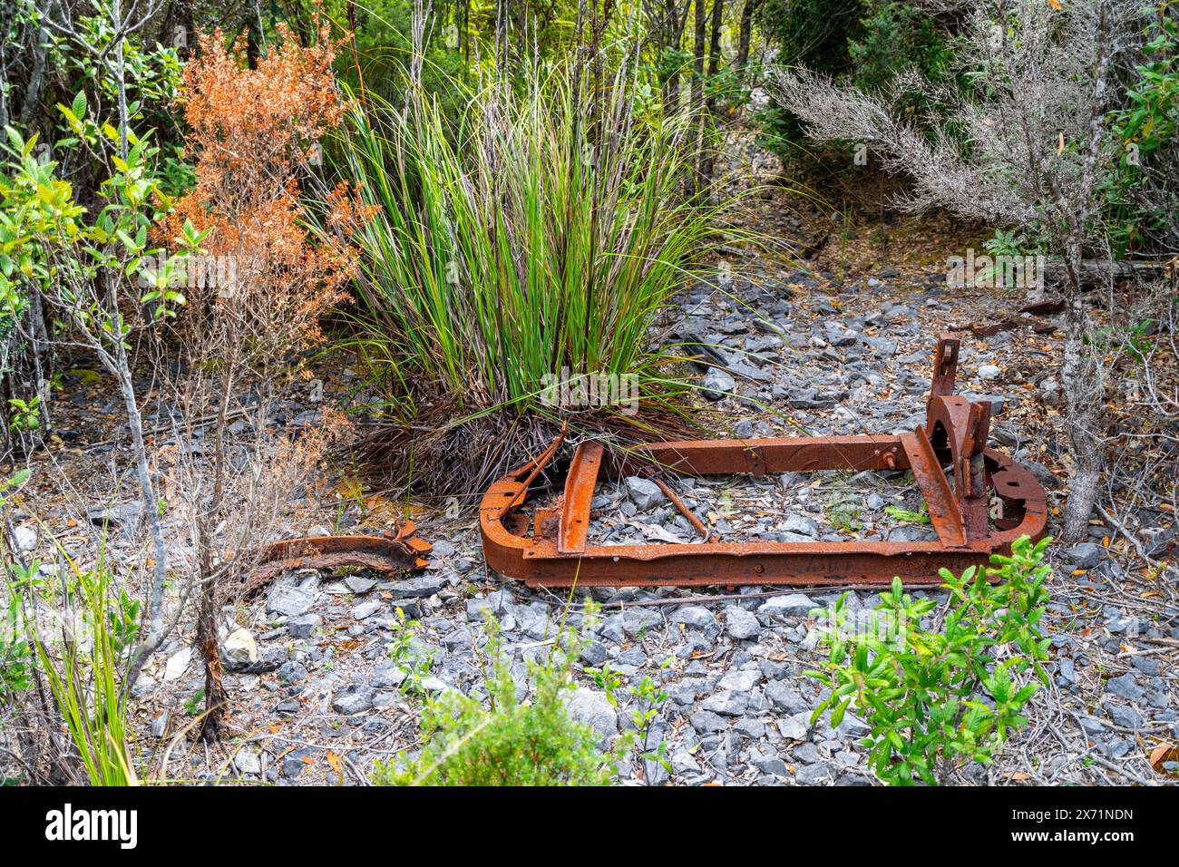 Abandoned rusted mining equipment on Mystery Creek walking track ...