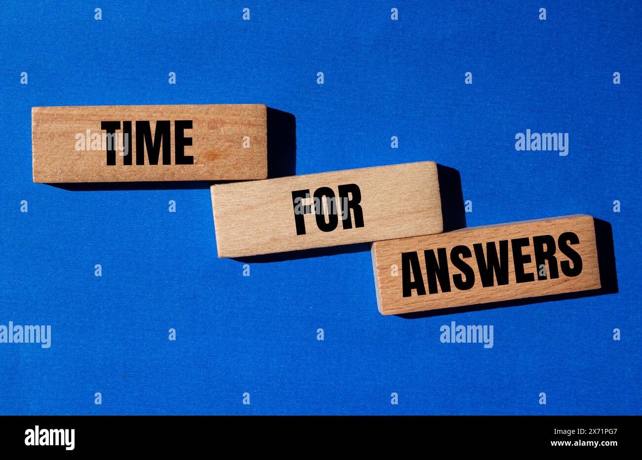 Time for answers words written on wooden blocks with blue background ...