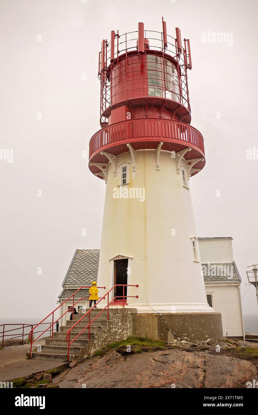 Family with children, visiting the Lindesnes Fyr Lighthouse in Norway ...