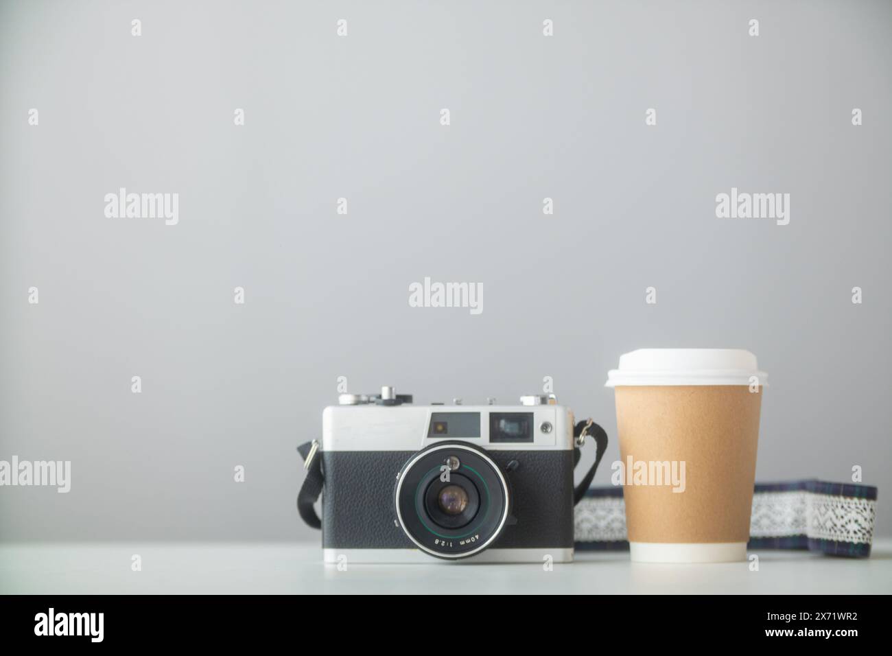 vintage style film camera sits on table in office It's film camera that ...