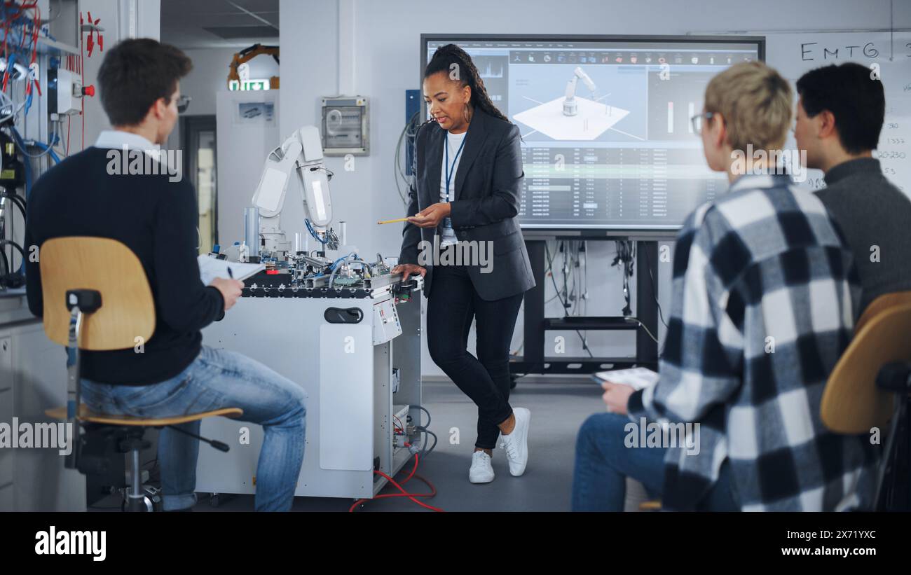 University Robotics Class: Black Teacher Explaining Engineering to ... University Robotics Class: Black Teacher Explaining Engineering to ...